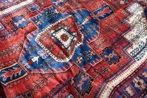 How To Fix a Buckled Rug - THERUGSGAL.COM