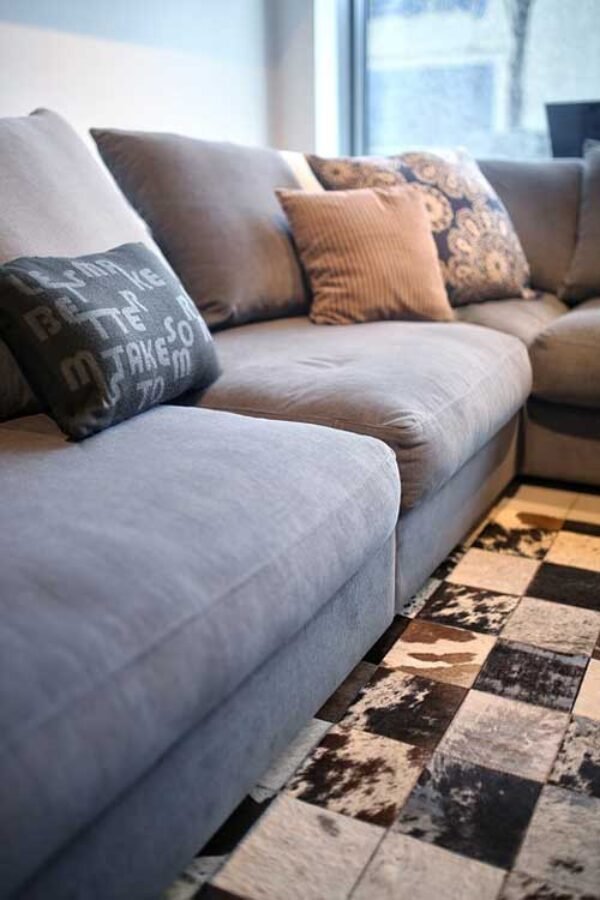 How to secure area rug on top of carpet - THERUGSGAL.COM